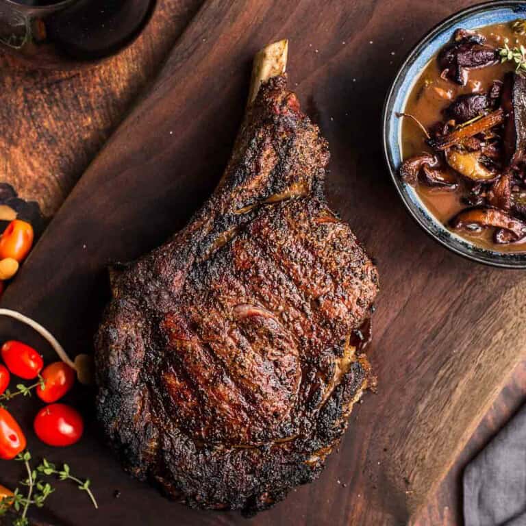Grilled Cowboy Ribeye Steak With Red Wine and Mushroom Sauce - Vindulge